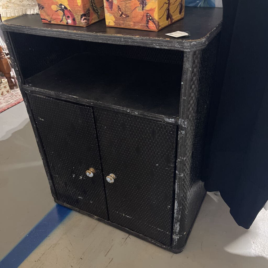 Small black wicker cabinet – Mississippi Antique Galleria